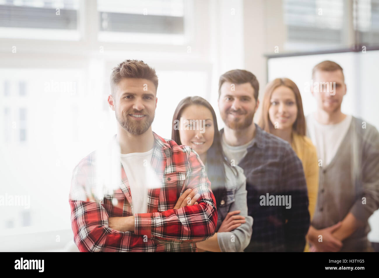 Business people standing in row Stock Photo - Alamy