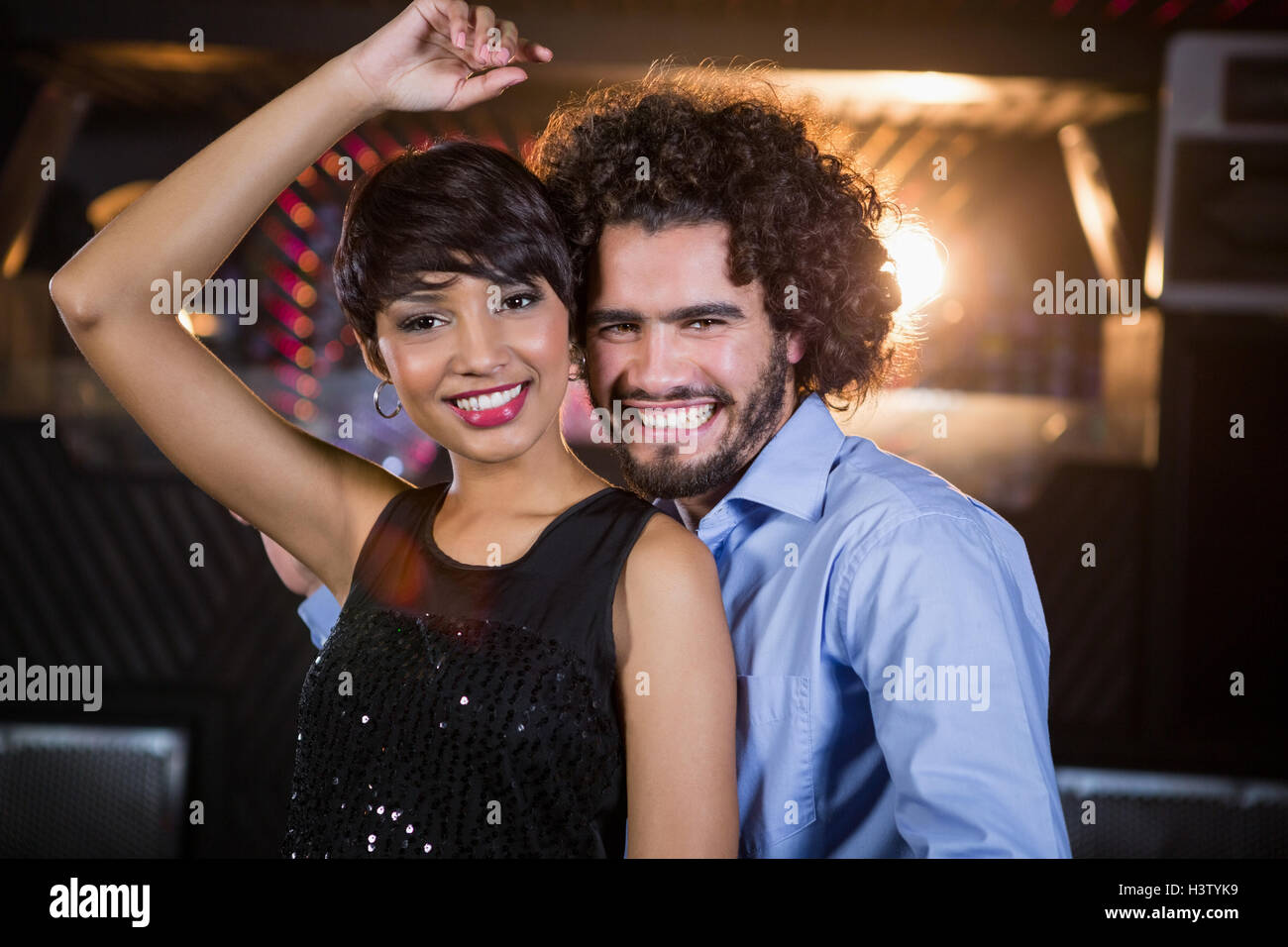 Cute couple dancing together on dance floor Stock Photo - Alamy