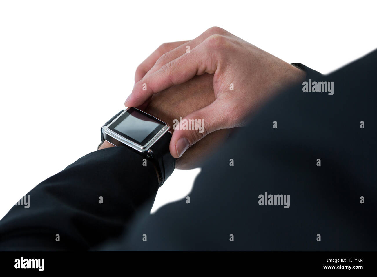 Businessman checking time Stock Photo - Alamy