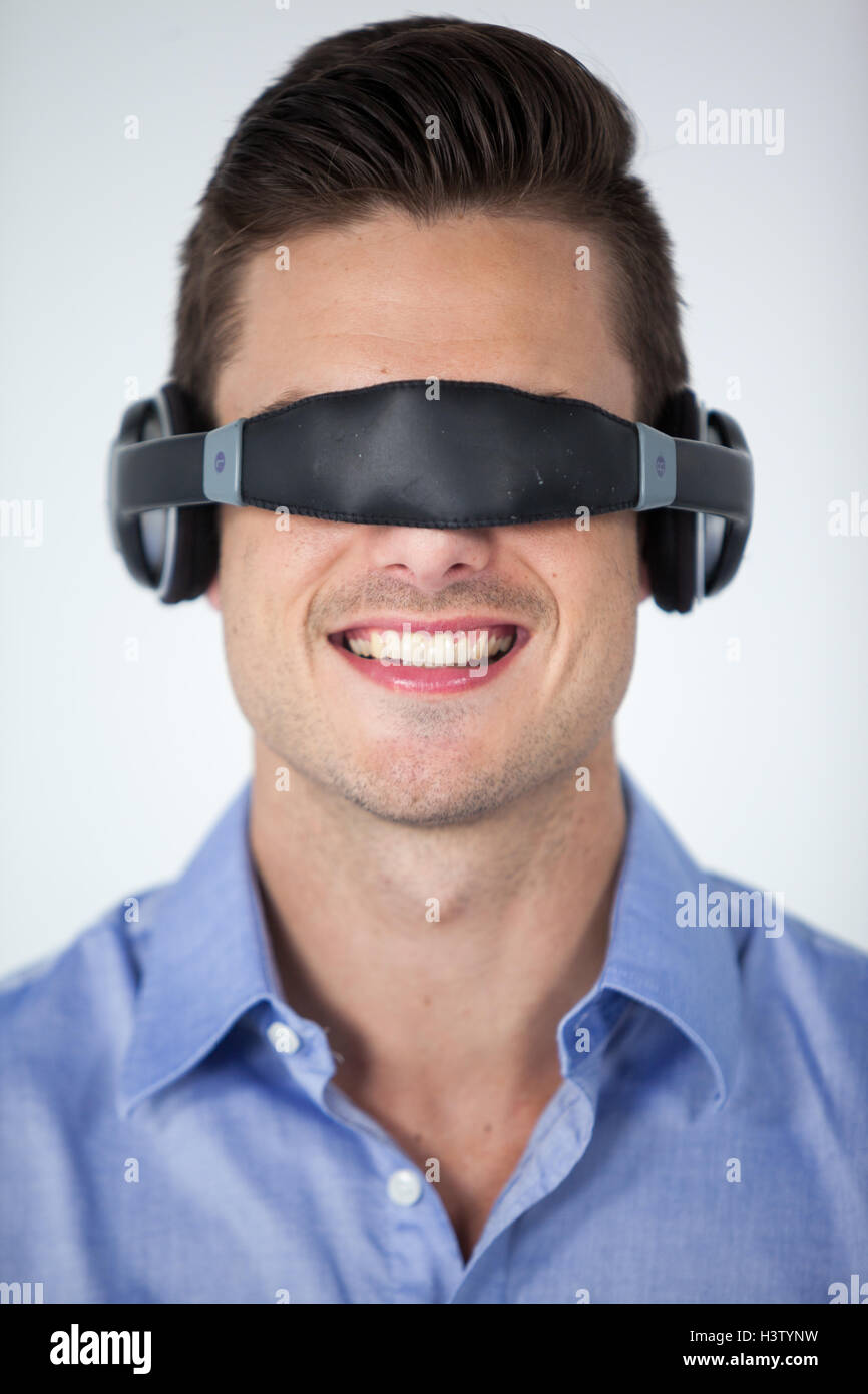 Man using virtual video glasses Stock Photo - Alamy