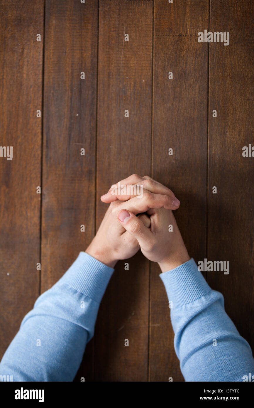 Praying hands of man Stock Photo - Alamy