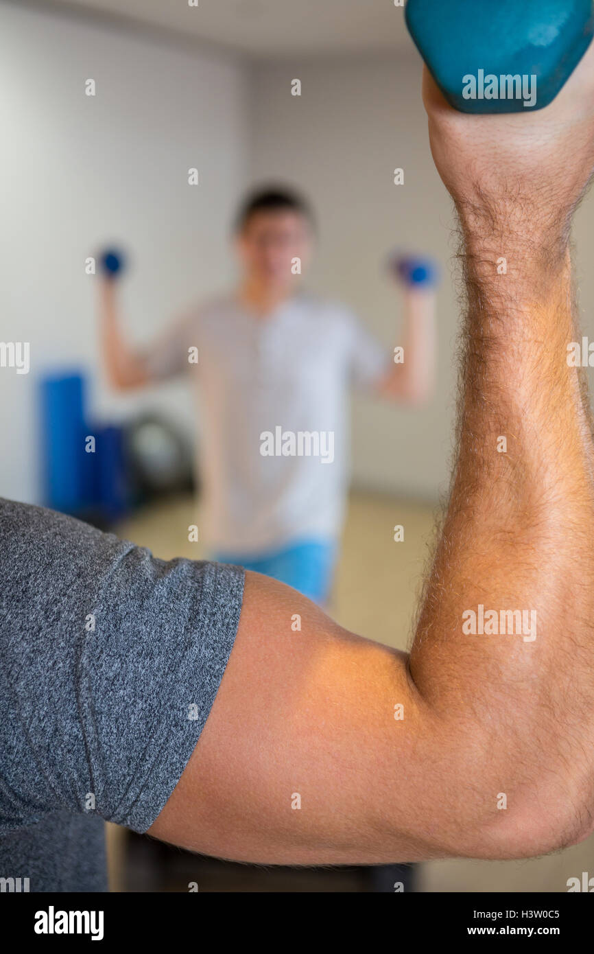 Close-up of mans hand lifting dumbbell Stock Photo - Alamy