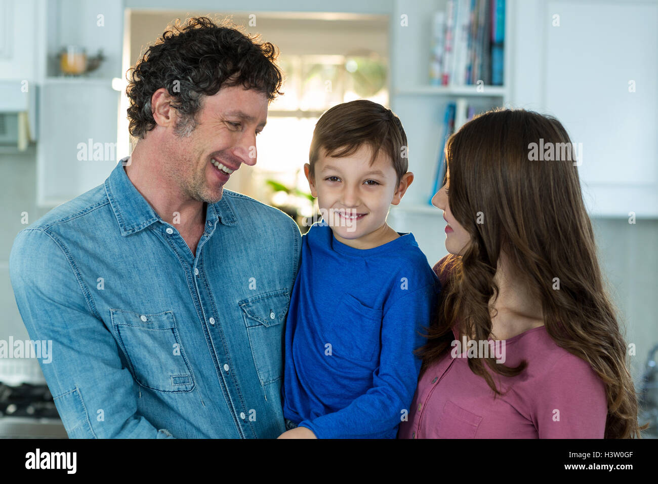 Family interacting with each other Stock Photo - Alamy
