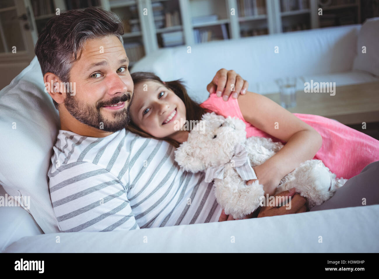 Smiling father daughter teddy bear hi-res stock photography and images ...