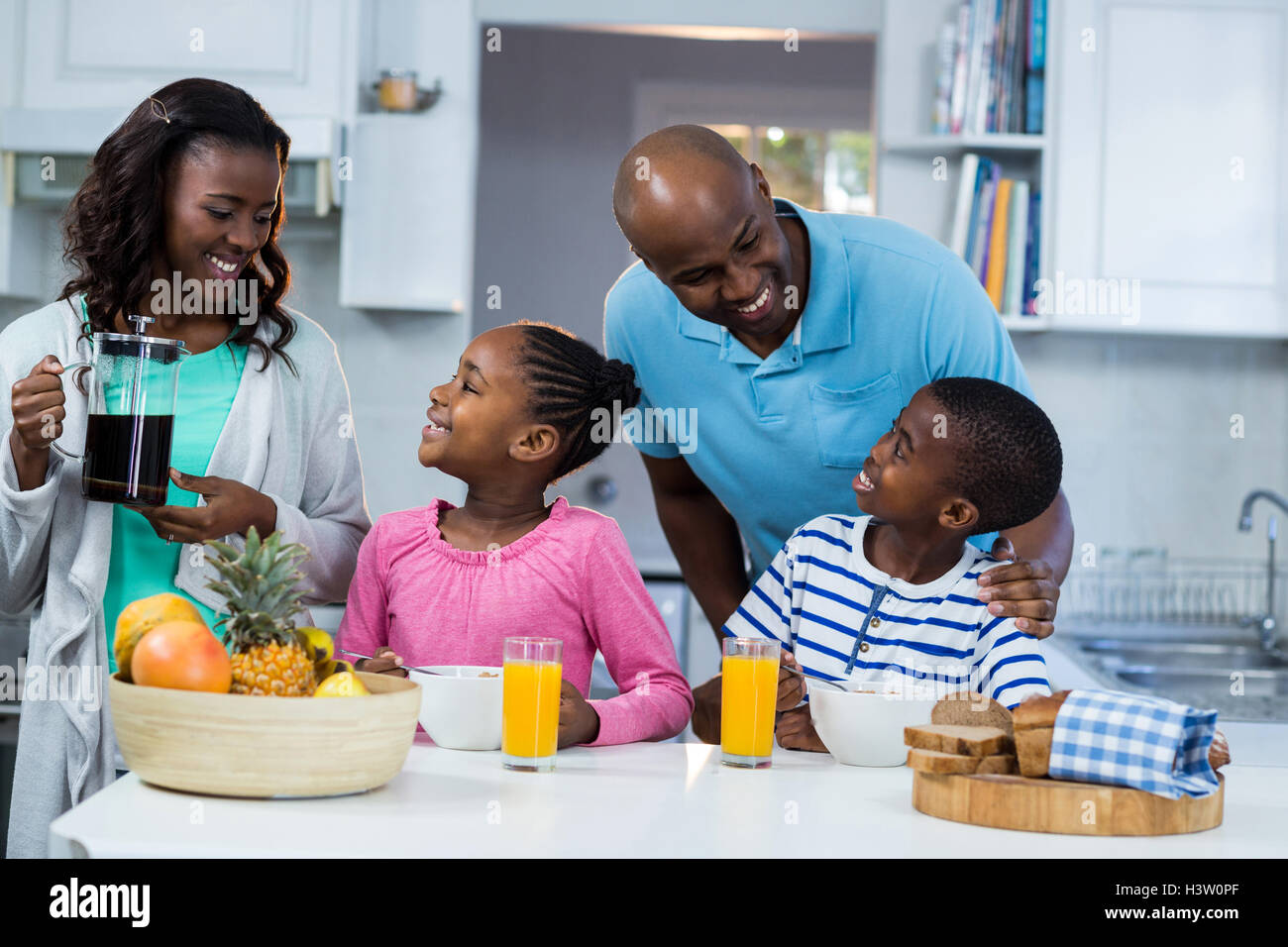 Family having breakfast Stock Photo - Alamy