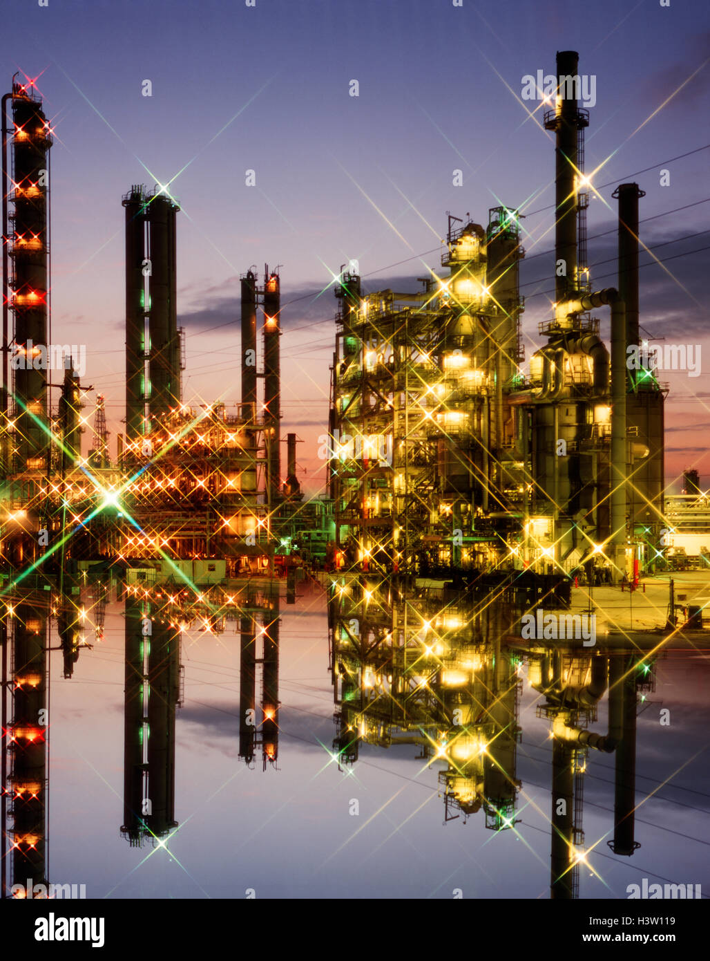 OIL REFINERY LIGHTS AT TWILIGHT Stock Photo - Alamy
