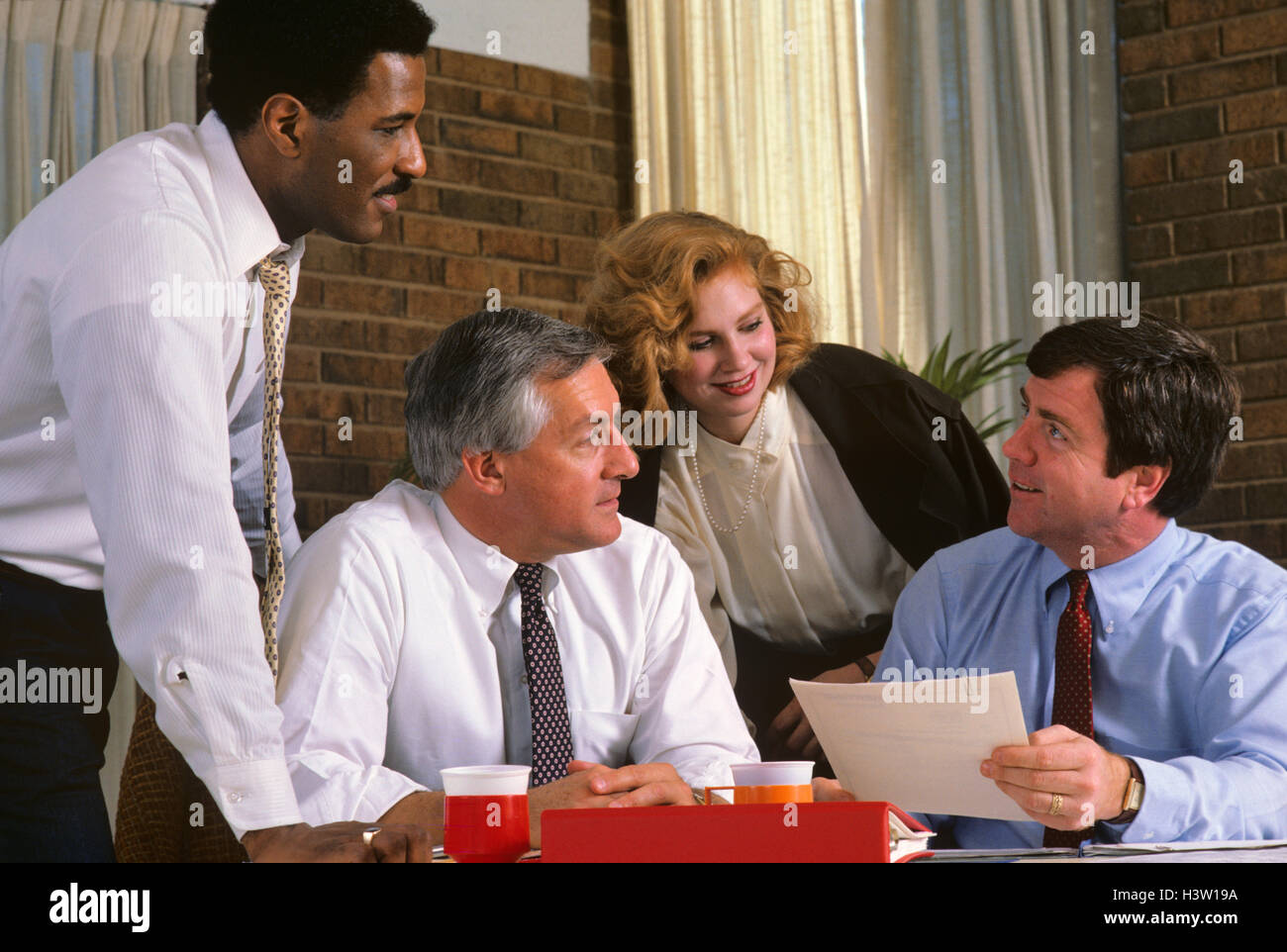 1980s DIVERSE GROUP MEN AND WOMEN IN BUSINESS MEETING Stock Photo - Alamy
