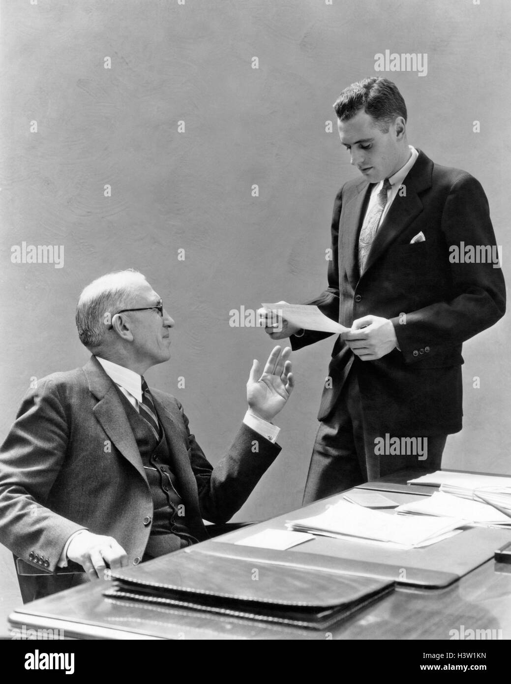 Boss desk male Black and White Stock Photos & Images - Alamy