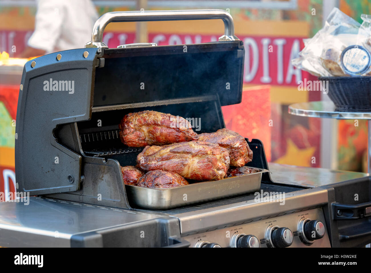 modern barbecue with meat Put on to cook Stock Photo - Alamy