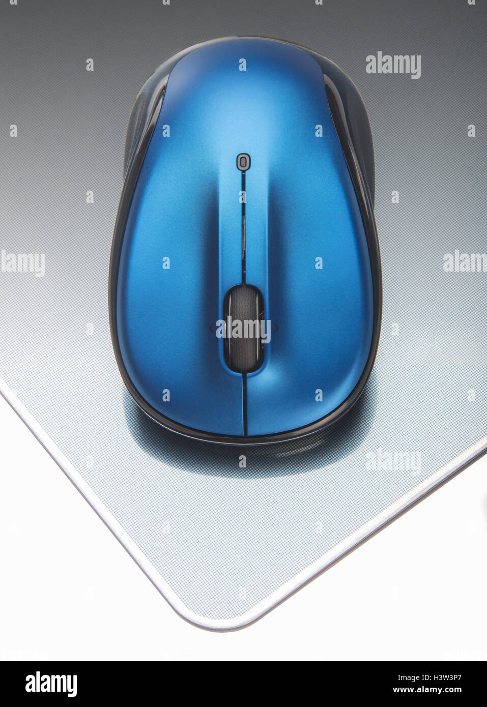 Small blue wireless mouse for portable laptop Stock Photo - Alamy