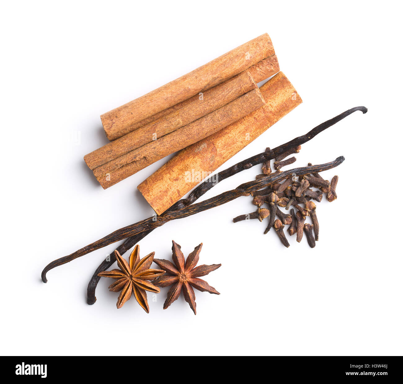 Vanilla, cinnamon, clove and anise star isolated on white background ...
