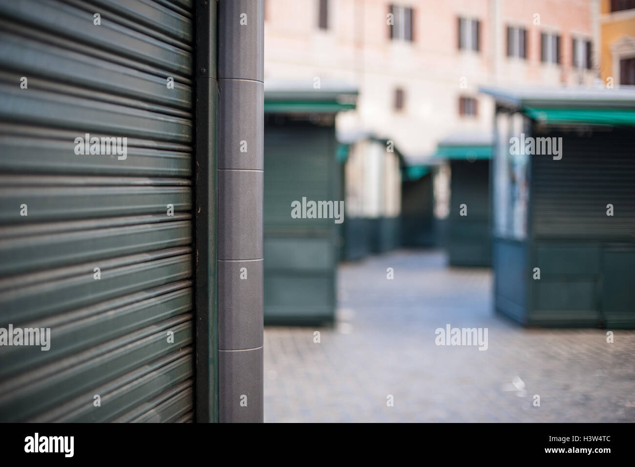 Store rolling shutter close up and out of focus background of many ...