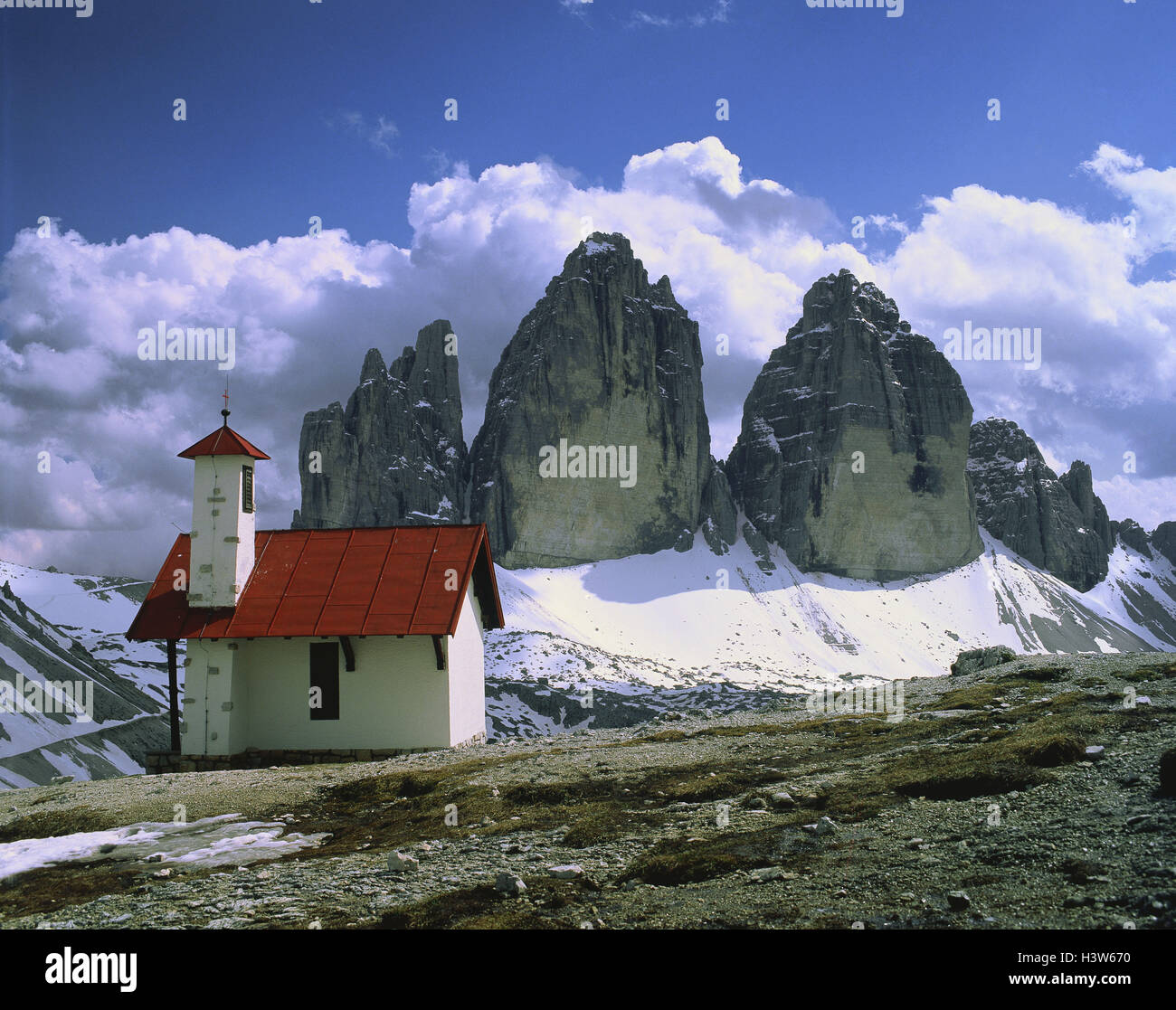 Italy, South Tyrol, the Dolomites, Three pinnacles, band, cloudy sky ...