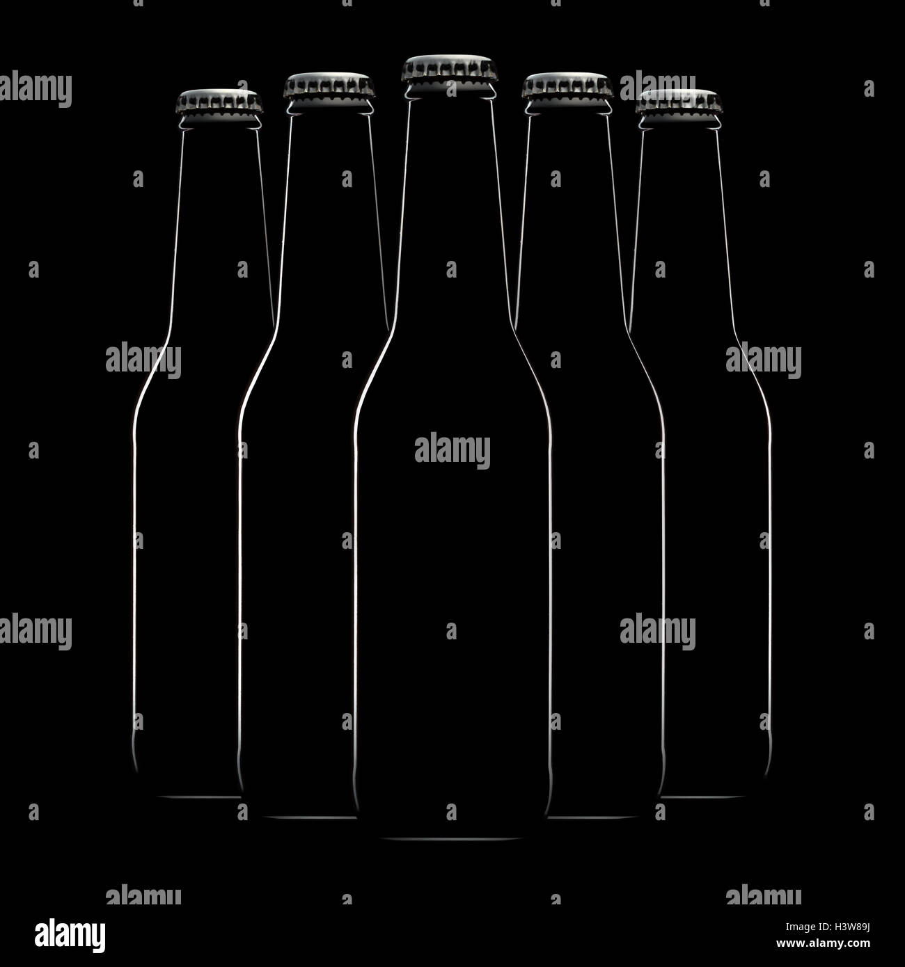 Set of beer bottles isolated on black background Stock Photo - Alamy