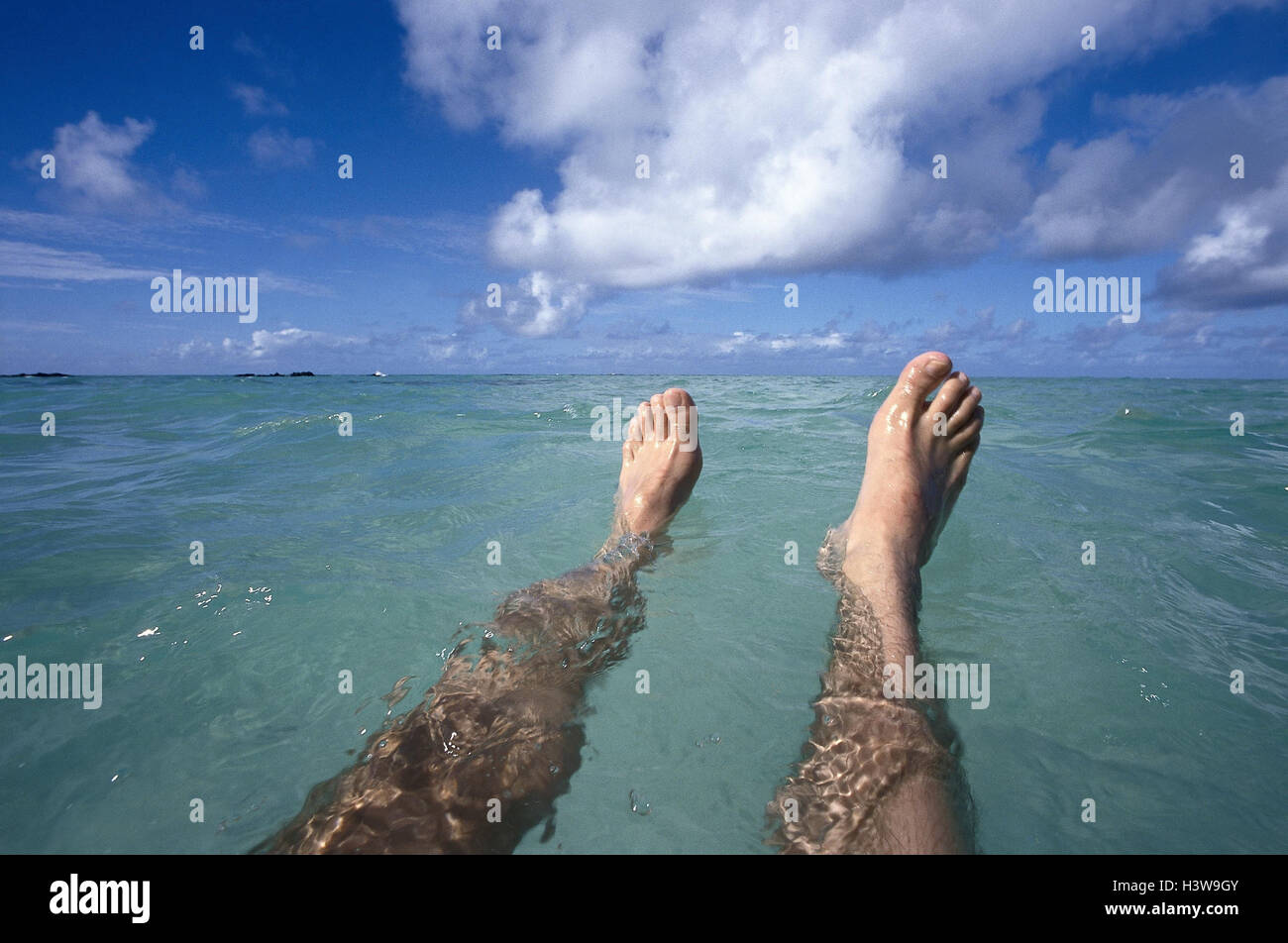 Sea, man, swim, detail, feet, cloudy sky, holidays & internationally ...
