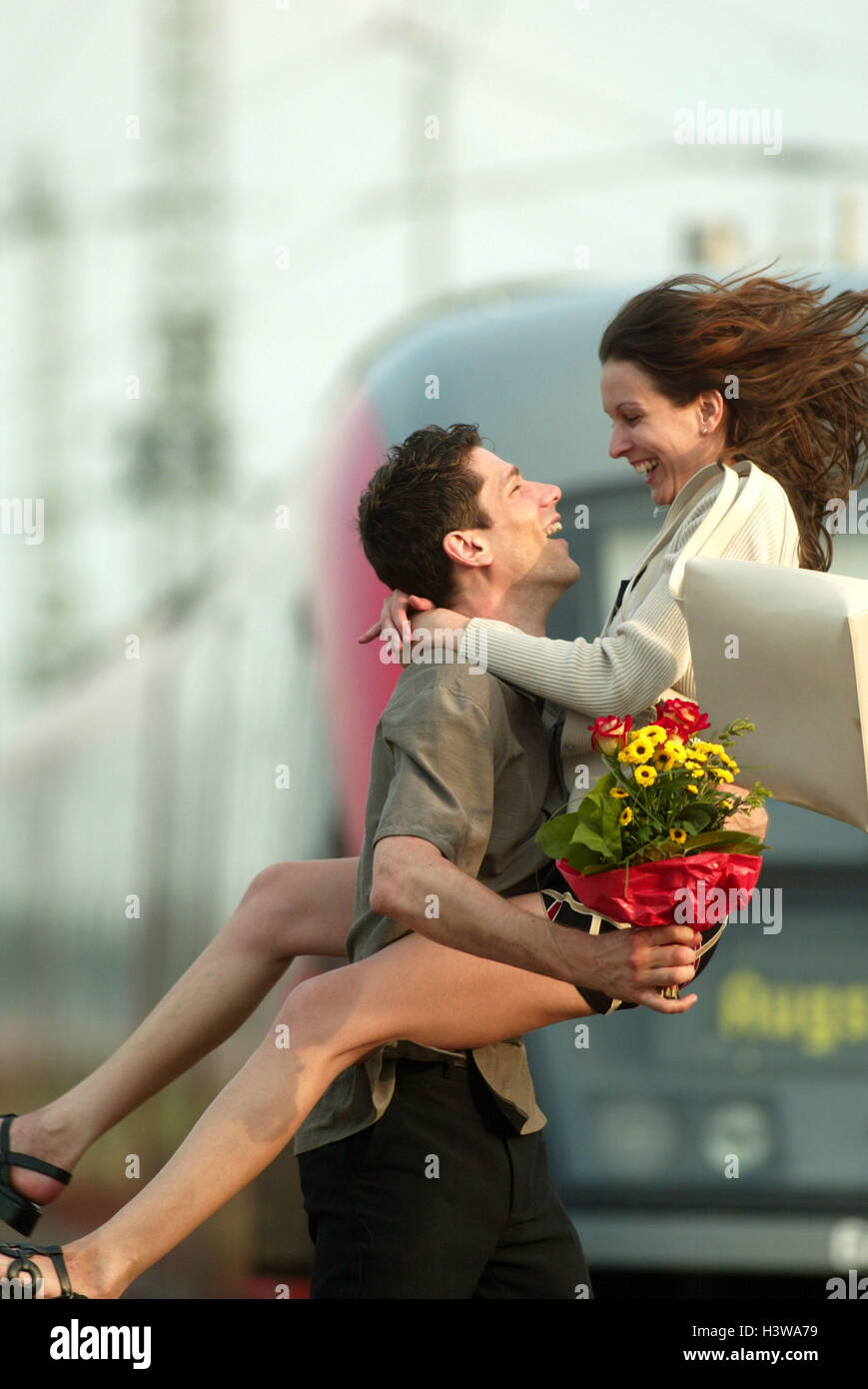 Platform, couple, greeting, embrace, bouquet, joy, melted railway ...