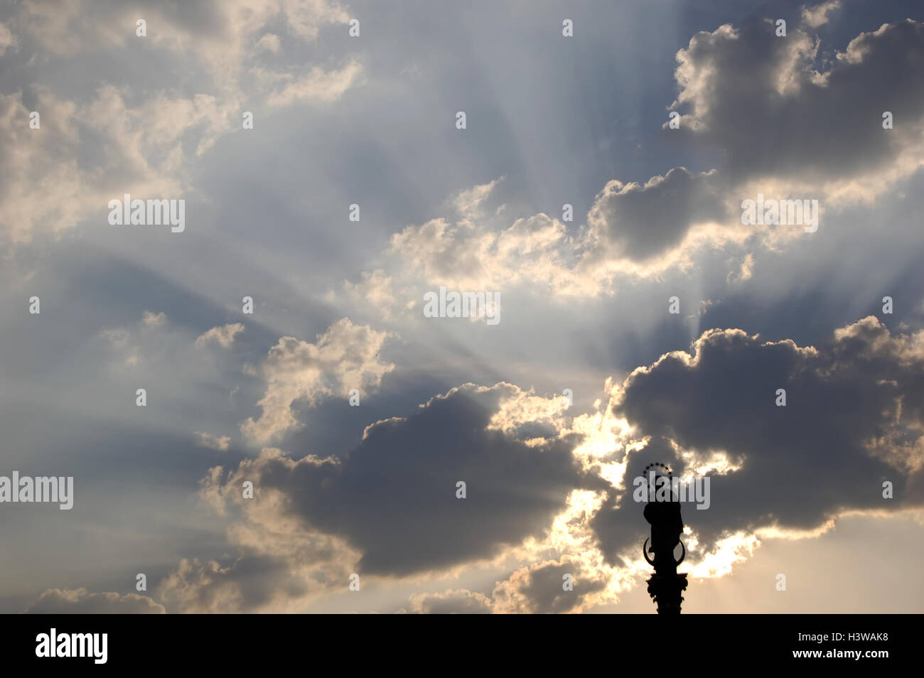 mystical sky and saint statue Stock Photo - Alamy