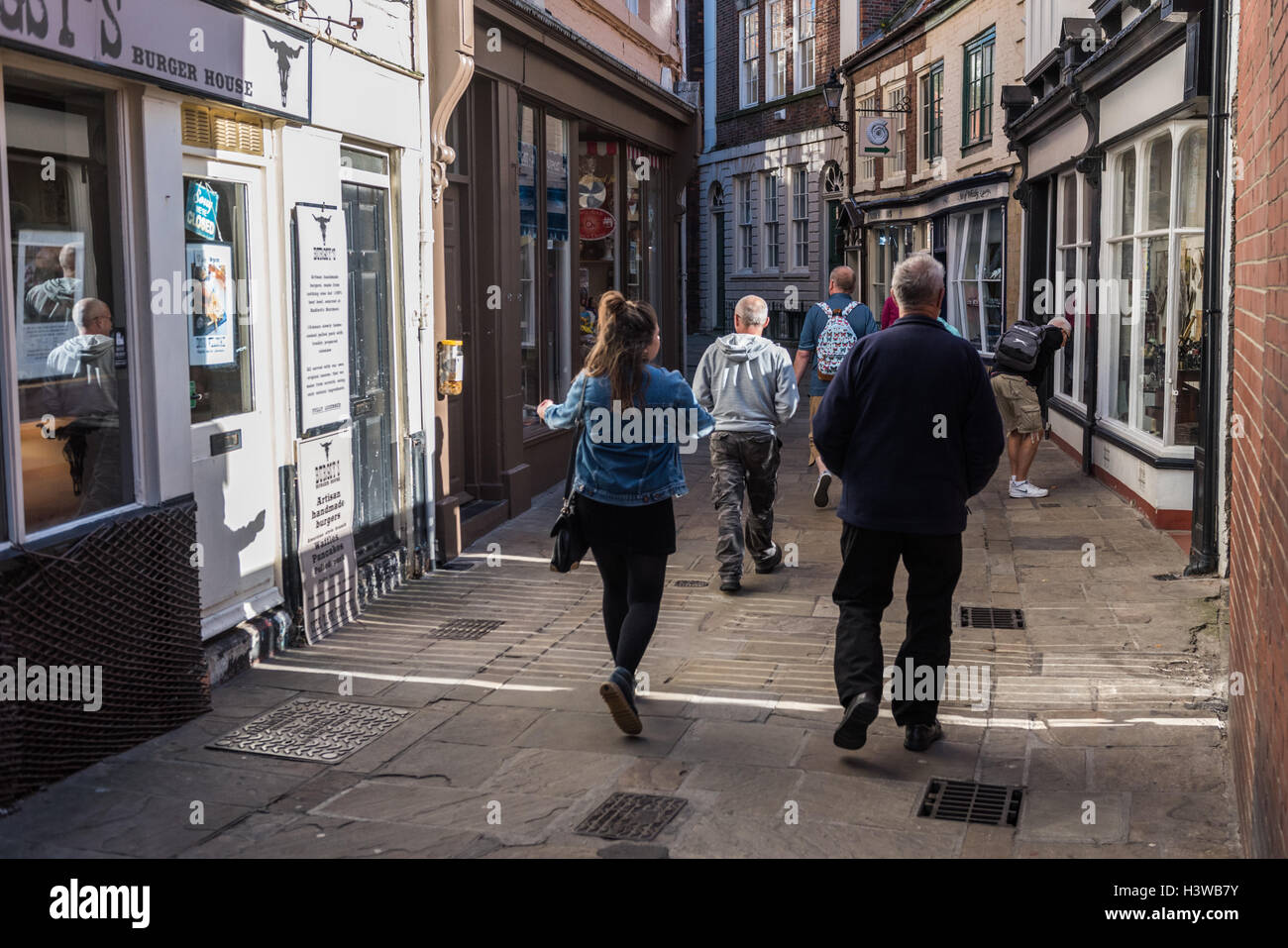Tourists walking along Grape Lane in Whitby Stock Photo - Alamy