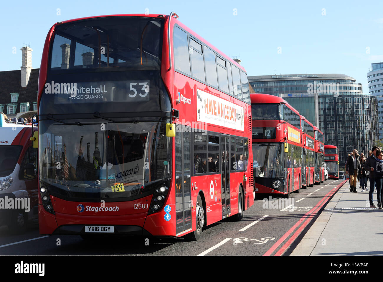 traffic jam buses bus queue London red routemaster Stock Photo - Alamy