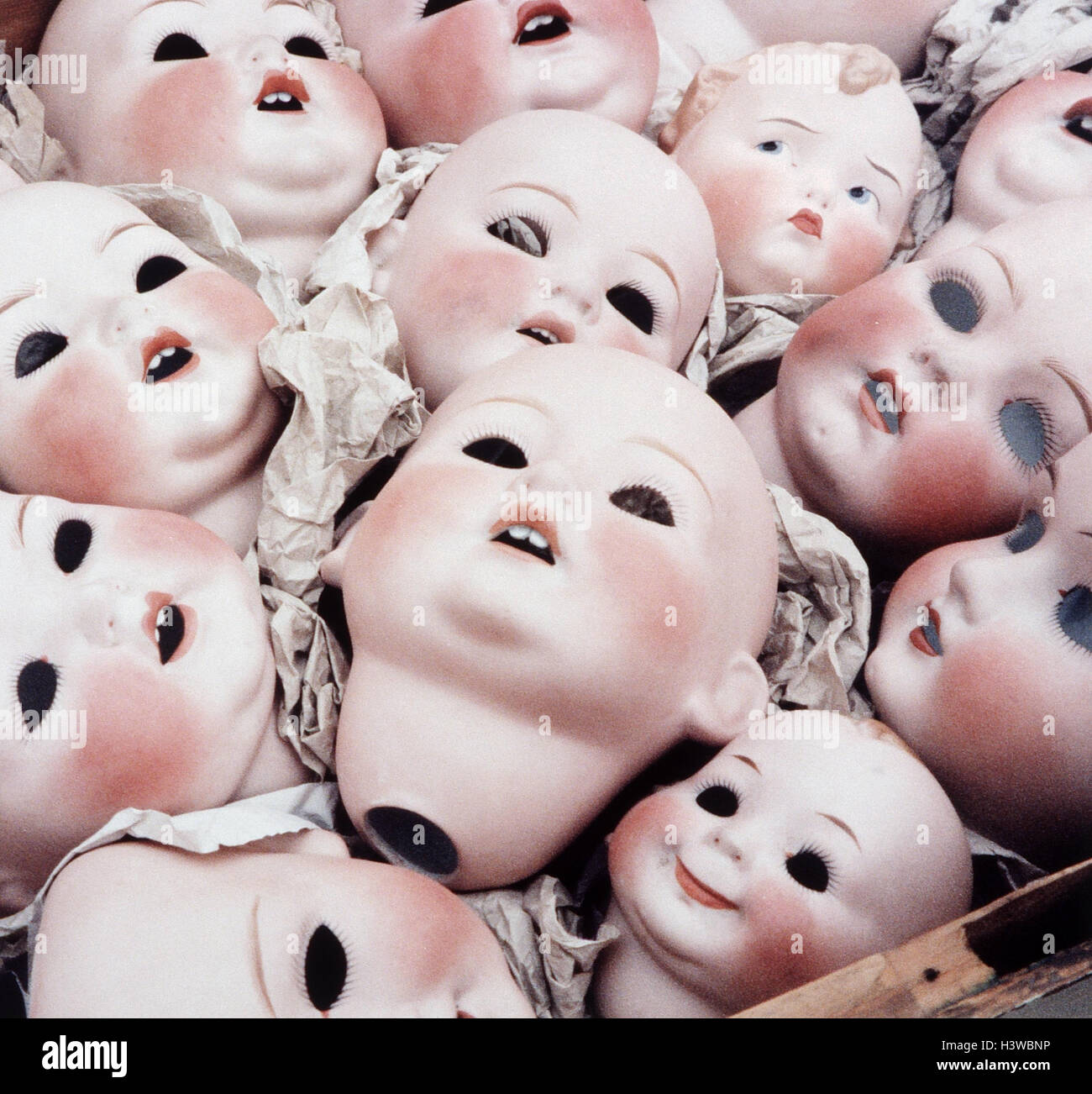 Dolls, detail, heads, factory, producing, manufacturing Stock Photo - Alamy