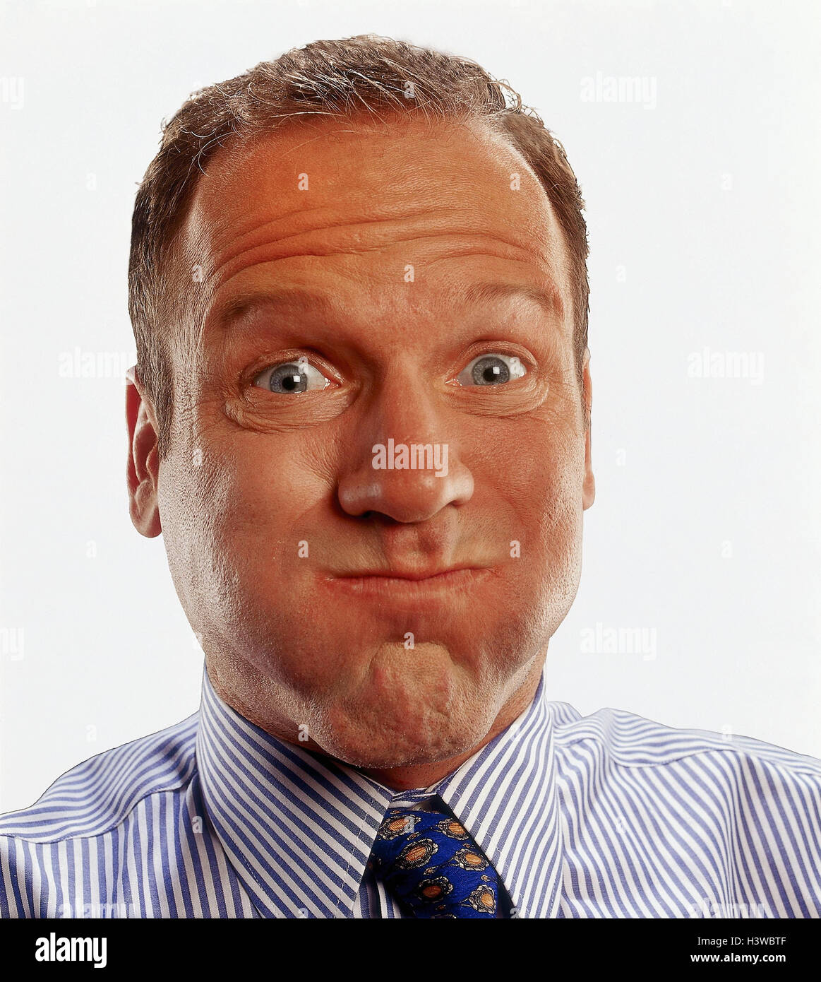 Man, facial play, cheeks, inflate, portrait, inside, studio, cut outs ...