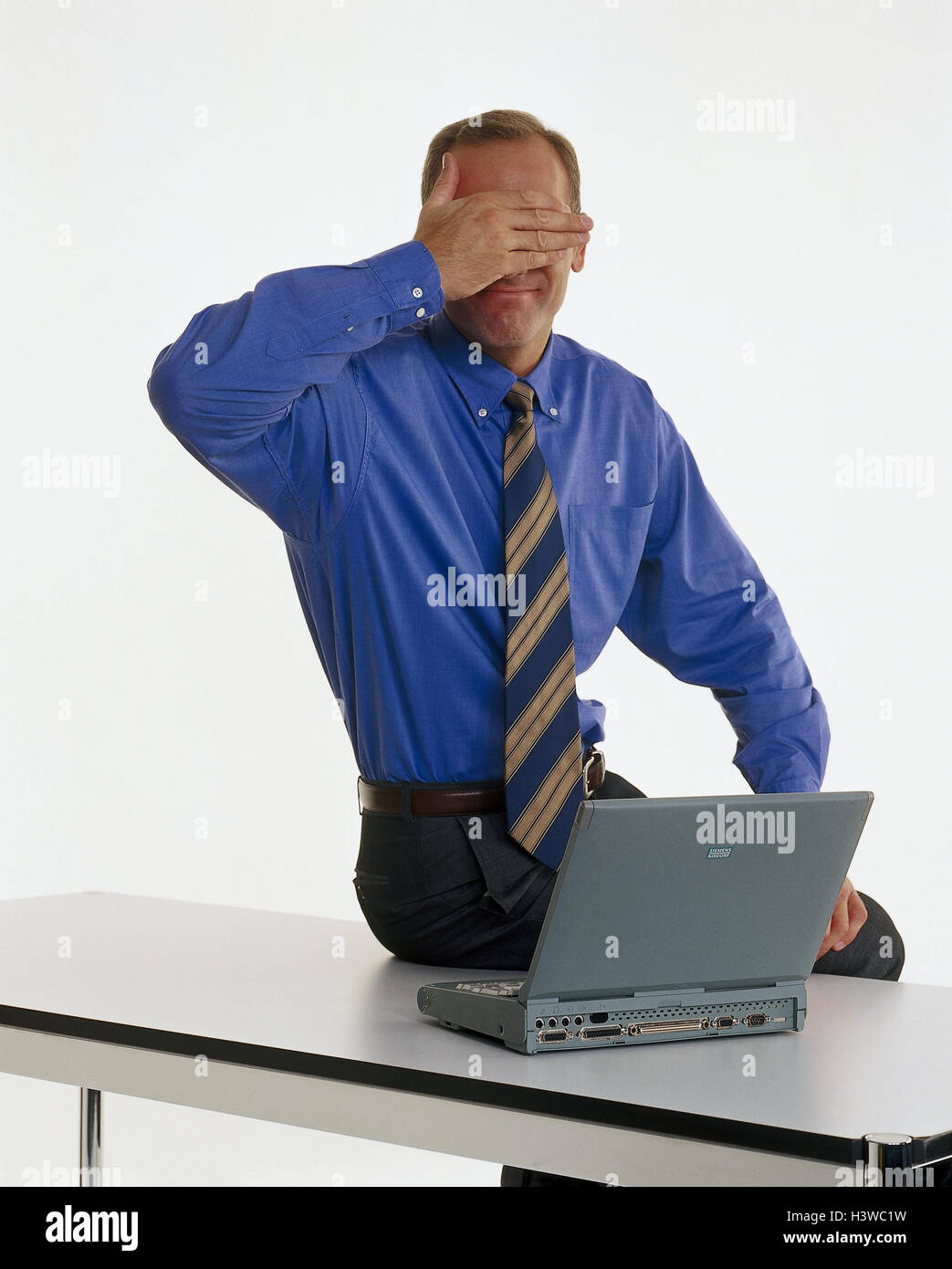 Businessman, young, laptop, gesture, eyes, cover, table, sit ...