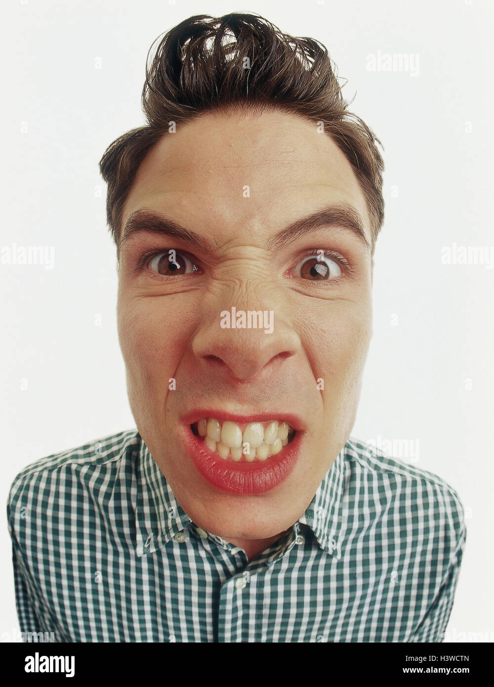 Man, young, shirt, checked, facial play, grimace, portrait, makes ...