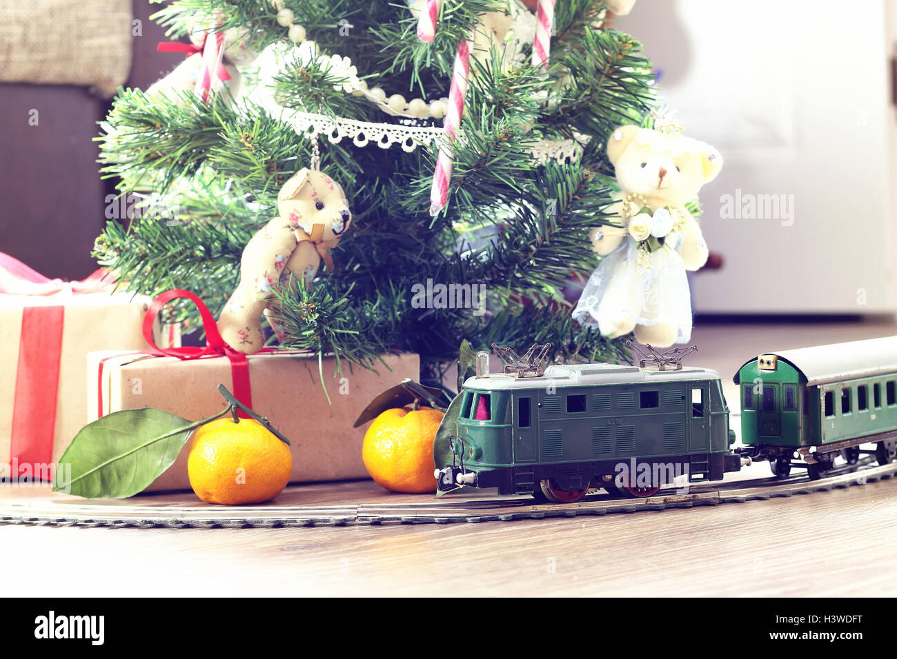train under tree gift Stock Photo - Alamy