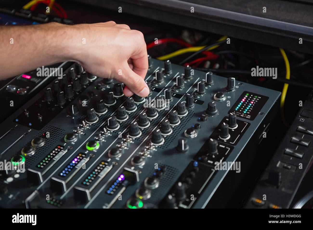 Male DJ playing music Stock Photo - Alamy