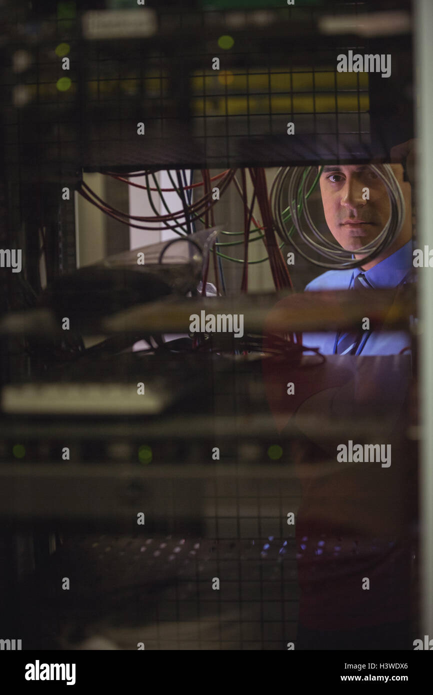 Technician connecting ethernet cables in hi-res stock photography and images - Alamy