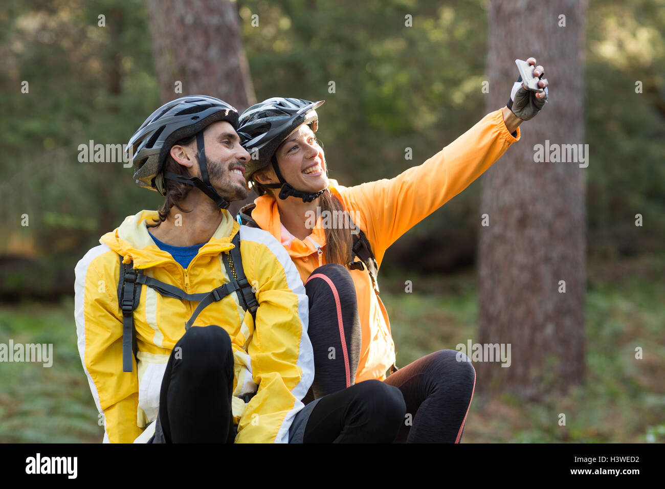 Fit woman photographing mobile phone hi-res stock photography and ...