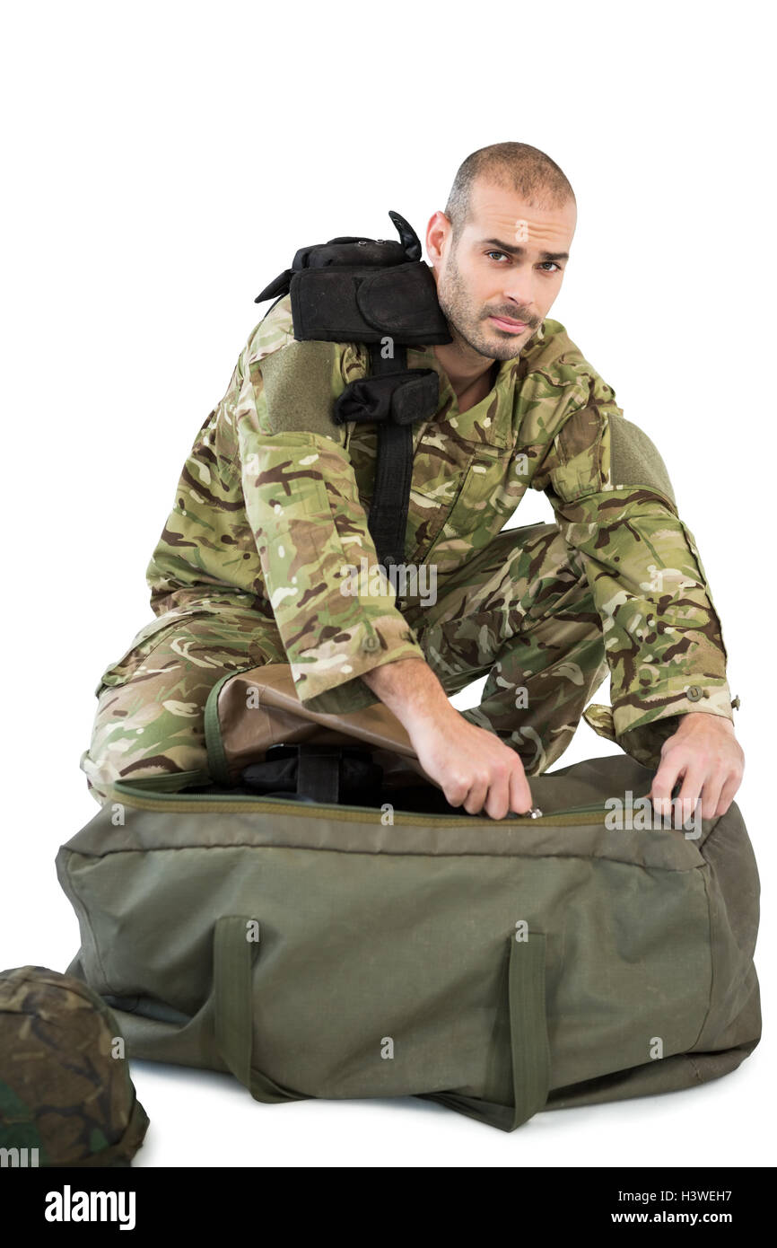 Solider packing his bag Stock Photo - Alamy
