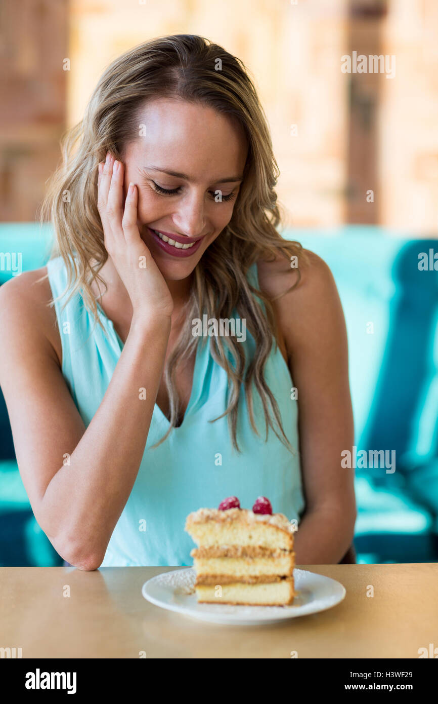 Woman thinking cake hi-res stock photography and images - Alamy