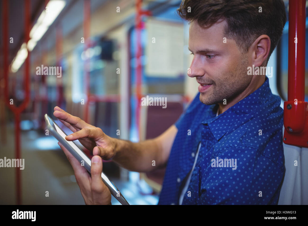 Reading train tablet hi-res stock photography and images - Alamy