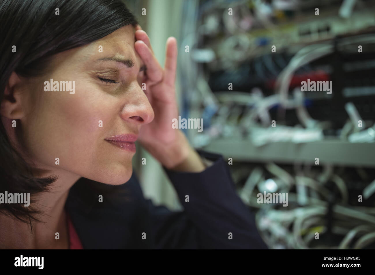 Technician getting stressed over server maintenance Stock Photo - Alamy