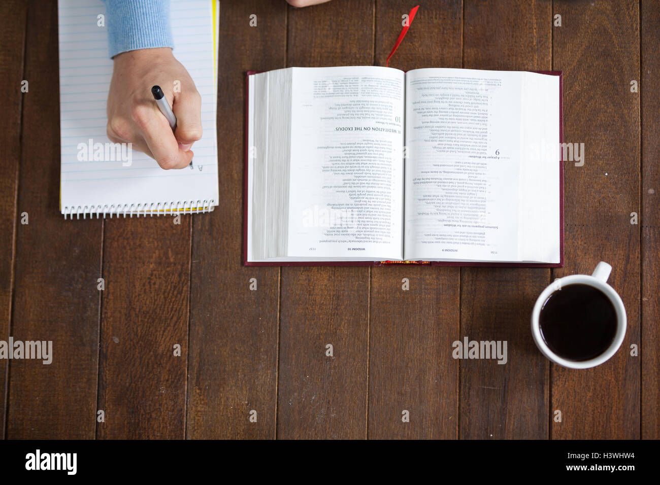 Man bible writing on notepad hi-res stock photography and images - Alamy