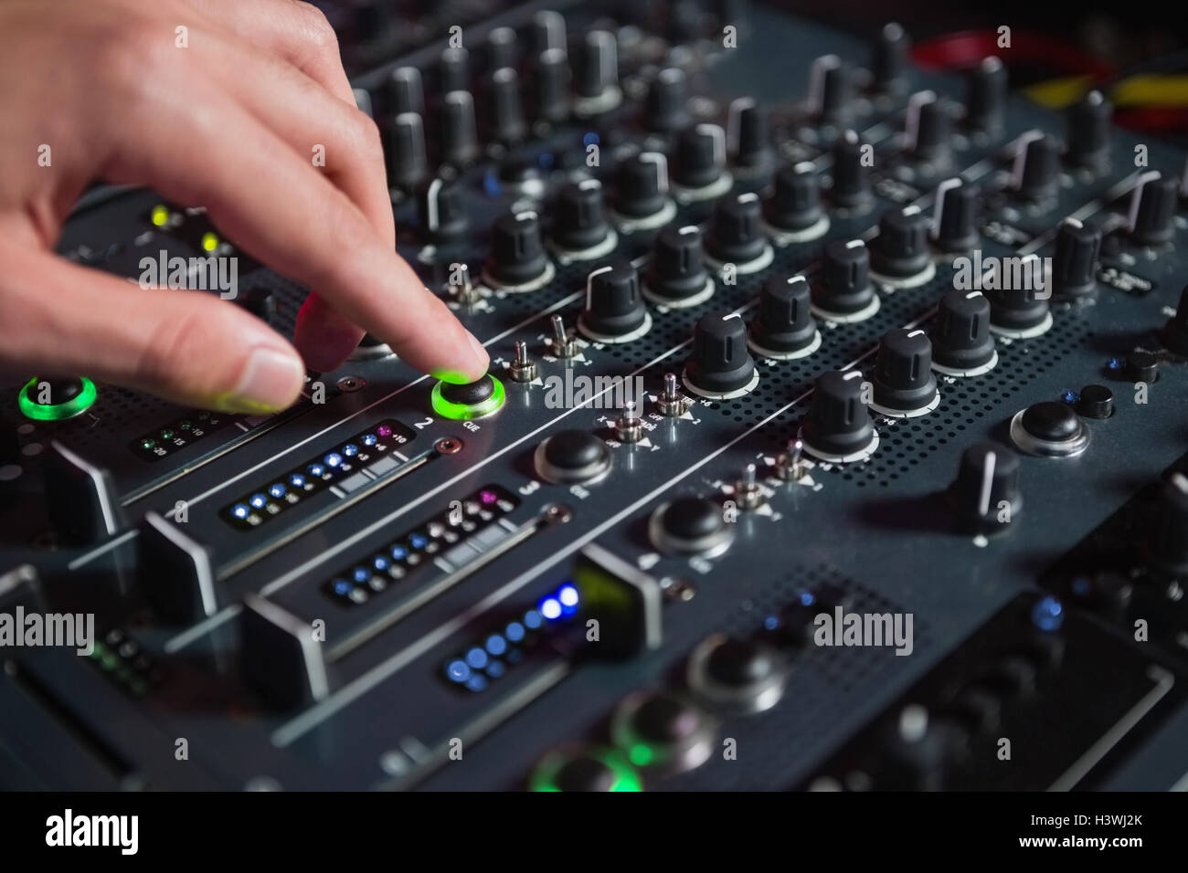 Male DJ playing music Stock Photo - Alamy