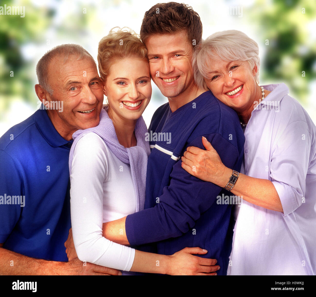 Couple, young, parents, embrace, laugh, group picture Families, family ...