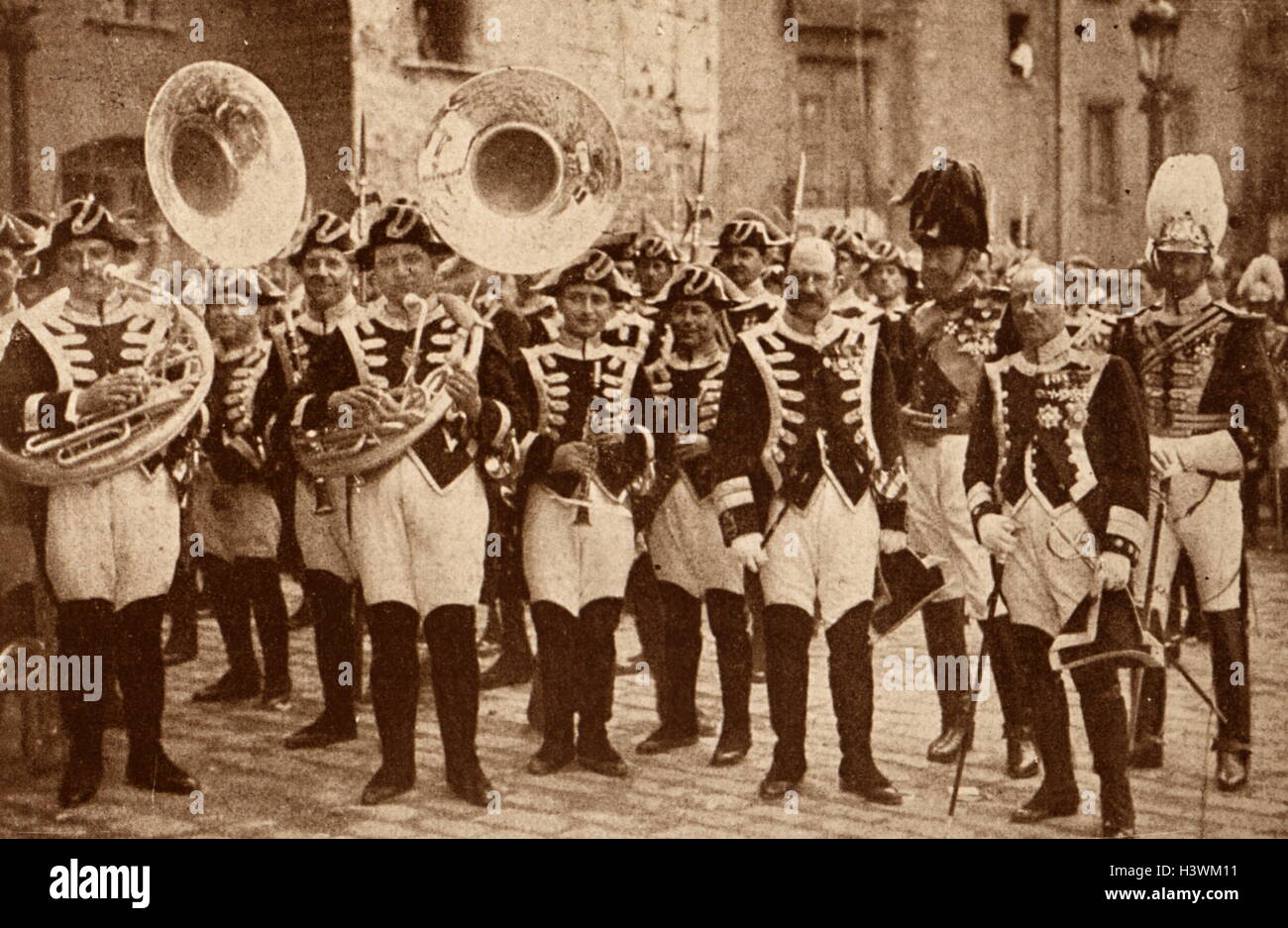 Photograph of the Alabarderos Royal Corps Band. Leading the band is ...