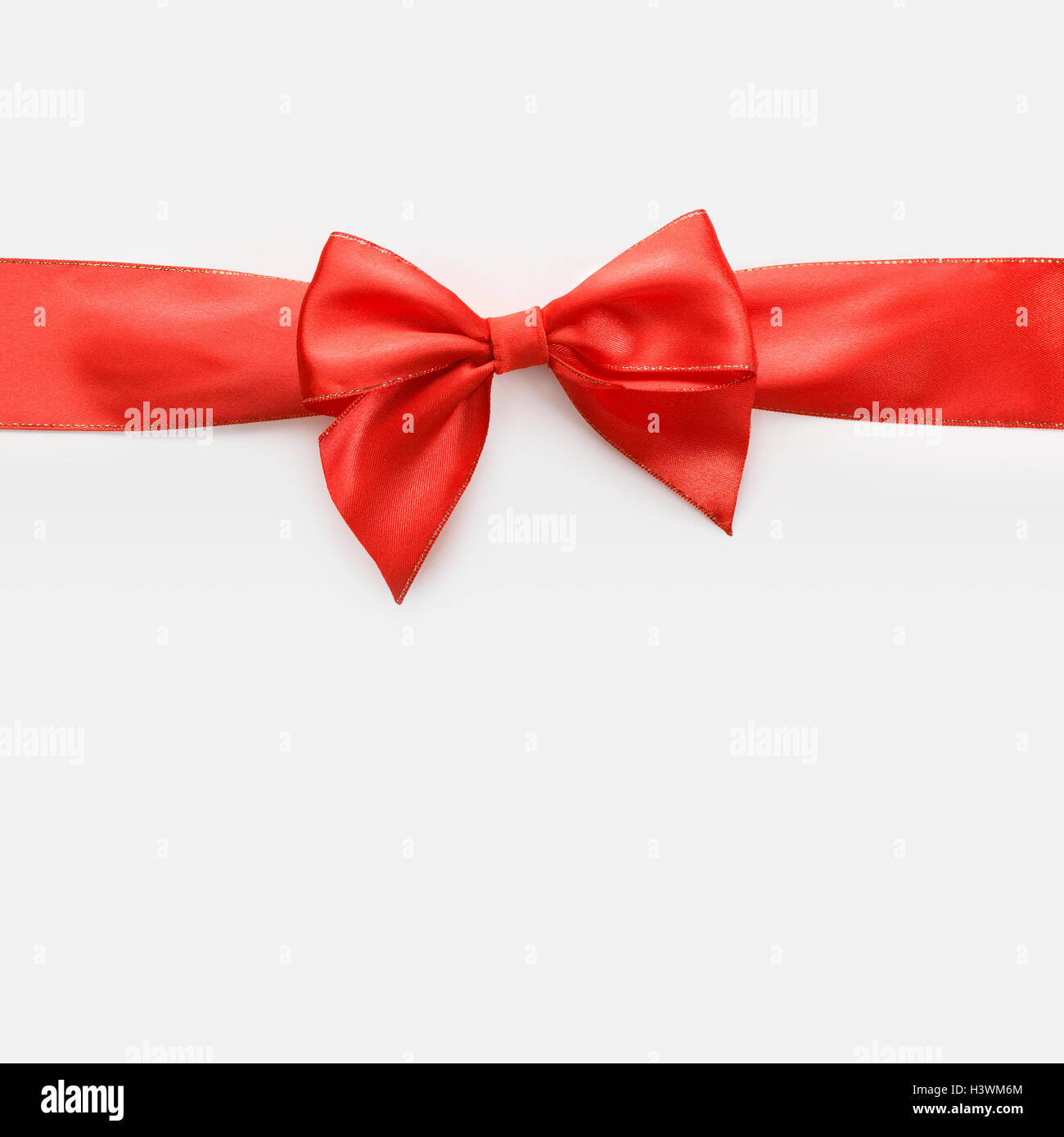 red satin bow Stock Photo - Alamy