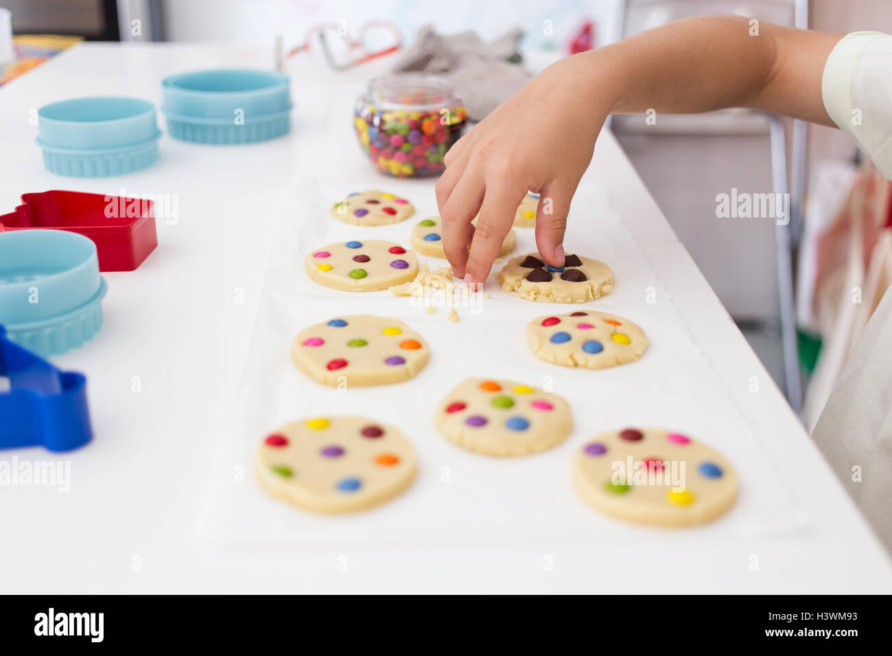 Boy making cookies Stock Photo - Alamy