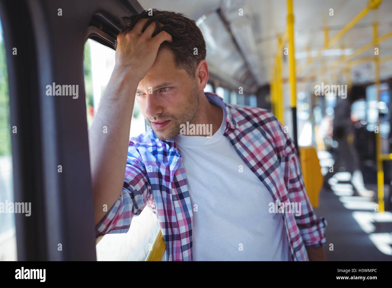 Handsome man travelling in bus Stock Photo - Alamy