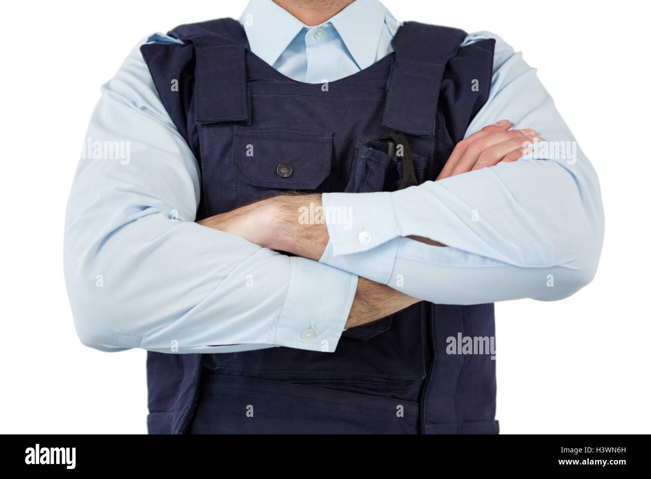 Security standing with arms crossed Stock Photo - Alamy