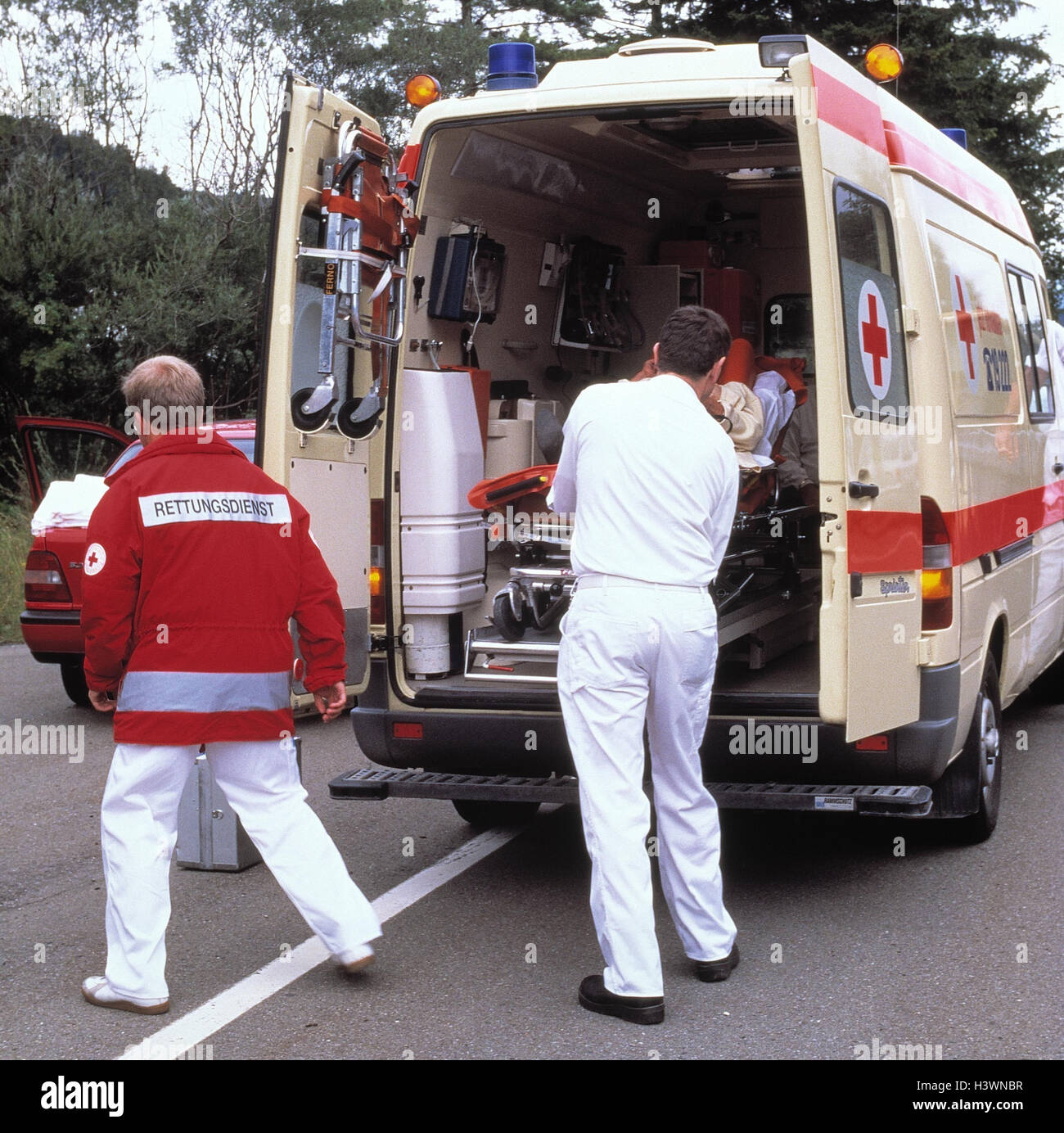 Ambulances, rescue cars, paramedics, injured person, patient, accident ...