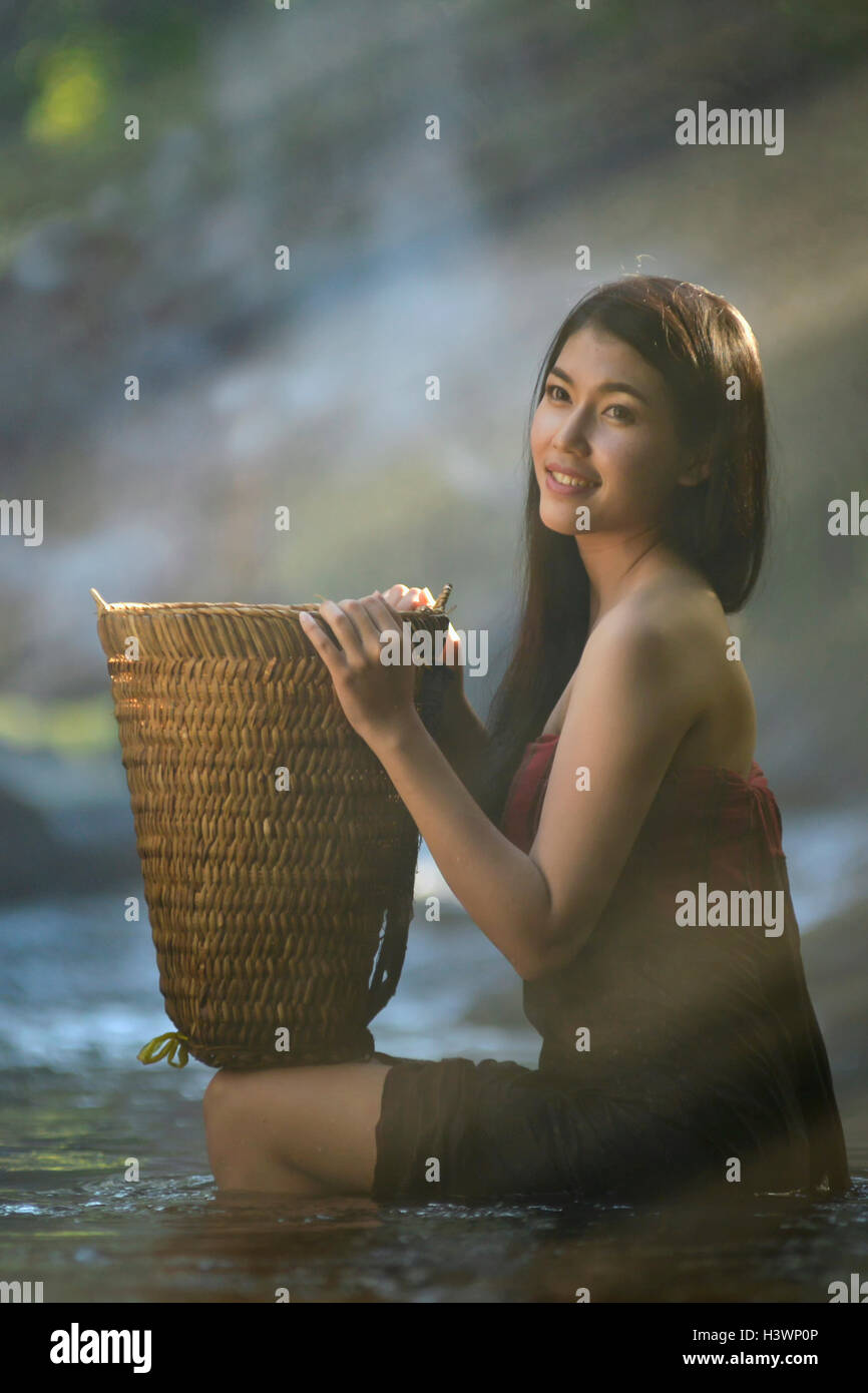 Woman in the river hi-res stock photography and images - Alamy