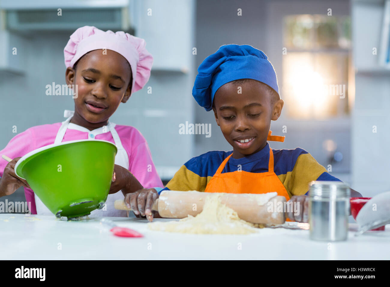 Children preparing cake Stock Photo - Alamy