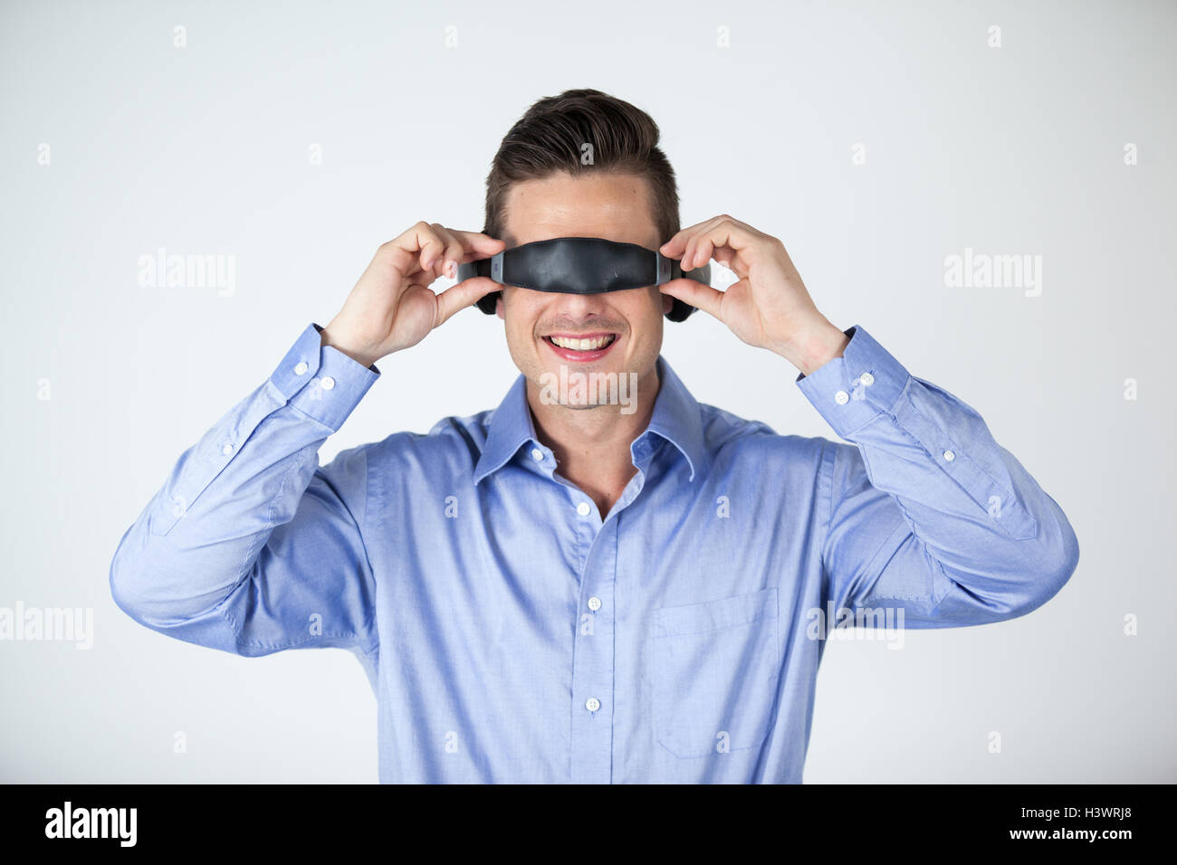 Man using virtual video glasses Stock Photo - Alamy