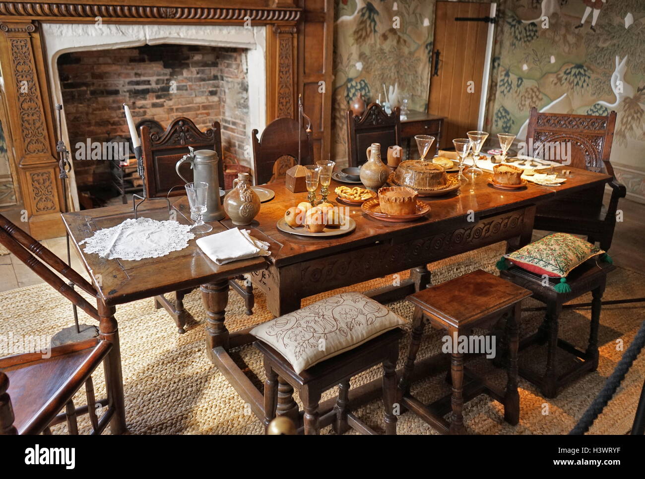 Elizabethan dining table set with typical foods, at Blakesley Hall is a ...
