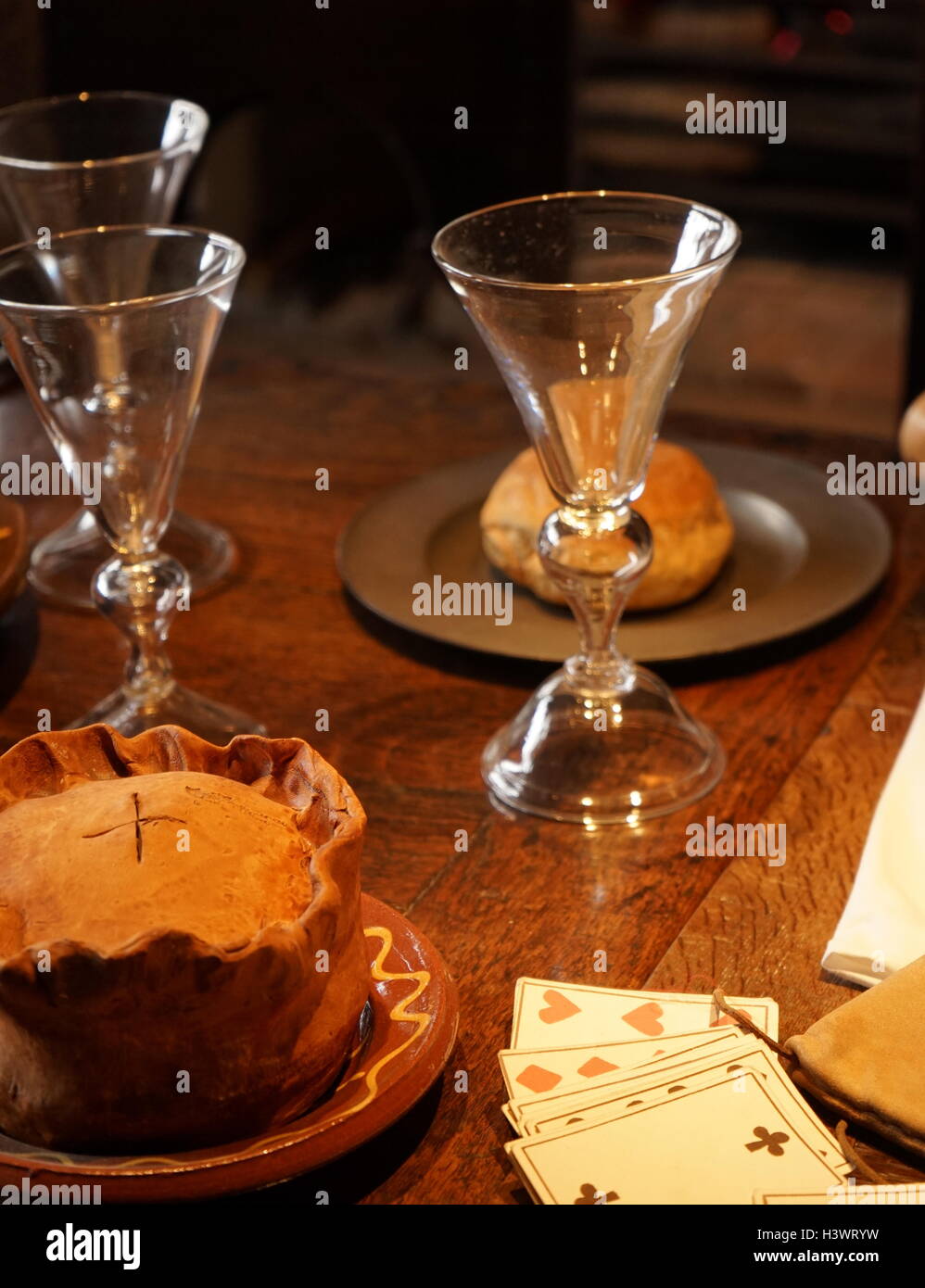 Elizabethan dining table set with typical foods, at Blakesley Hall is a ...