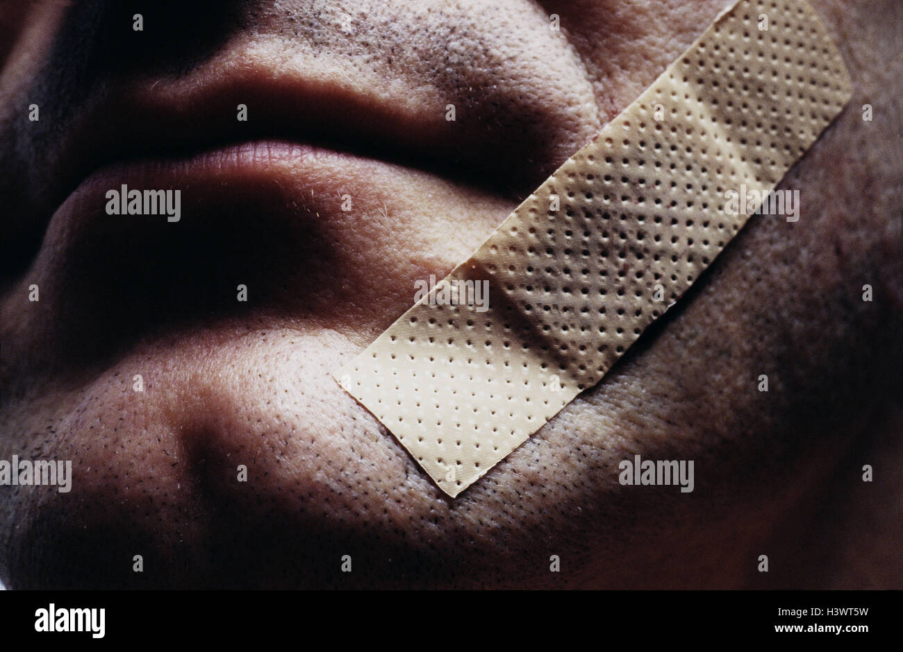 Man, look, area around the mouth, injury, adhesive plaster, close up ...